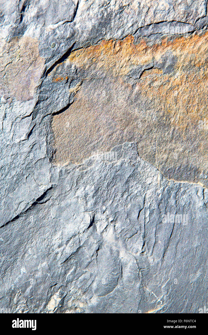 rocks stone and red orange gneiss in the wall of morocco Stock Photo ...