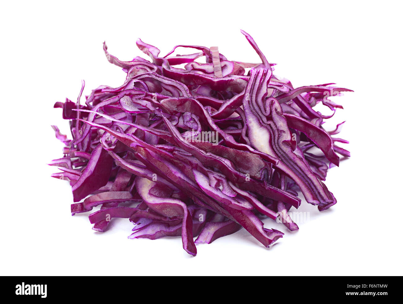 Red cabbage slice heap isolated on white Stock Photo - Alamy