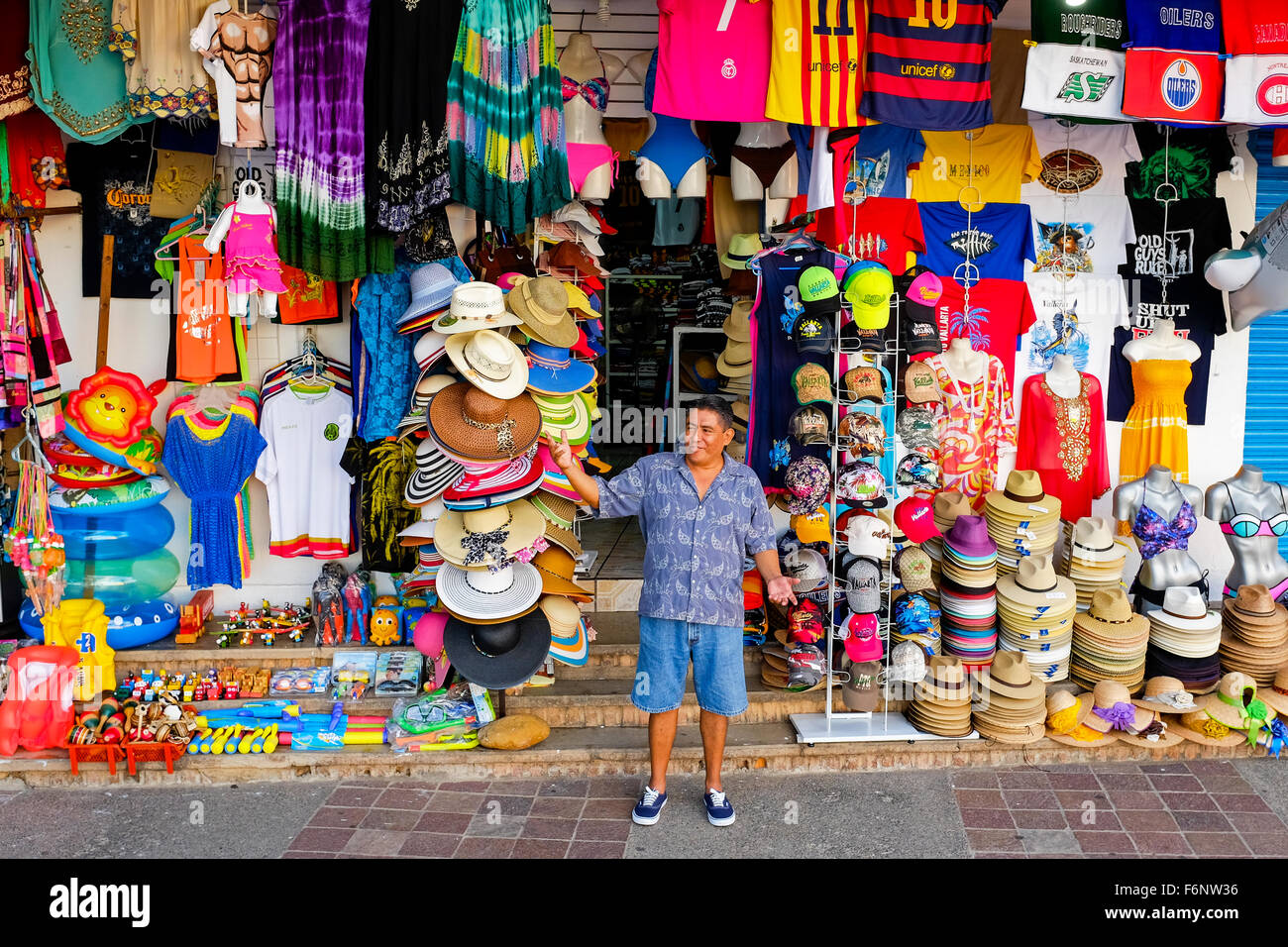 Shopkeeper outside his souvenir shop, on El Macelon, Centro Zone ...