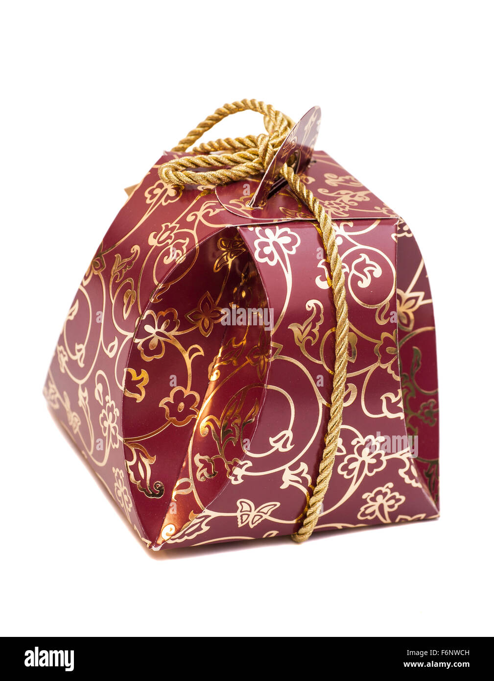 Christmas gift box with golden rope on white Stock Photo - Alamy