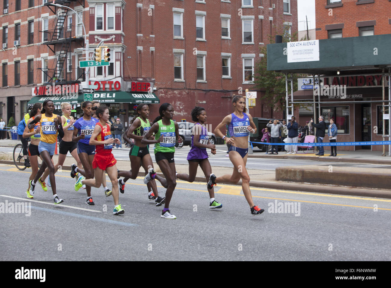 Front runners in the women's division come down 4th Avenue in Park ...