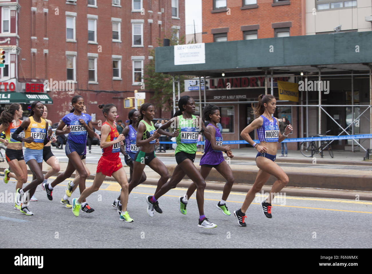 Front runners in the women's division come down 4th Avenue in Park ...