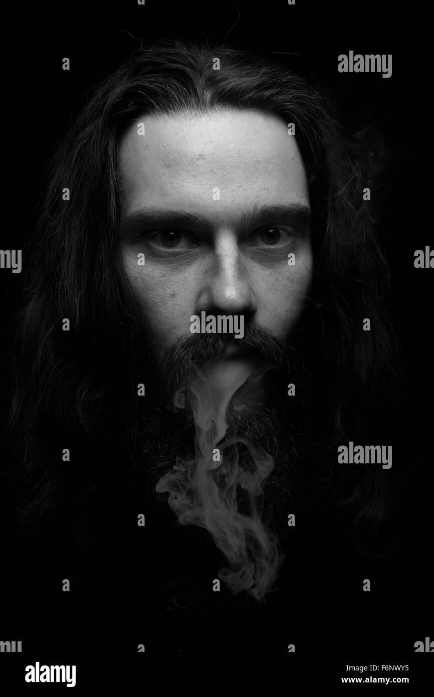 smoking man Stock Photo - Alamy