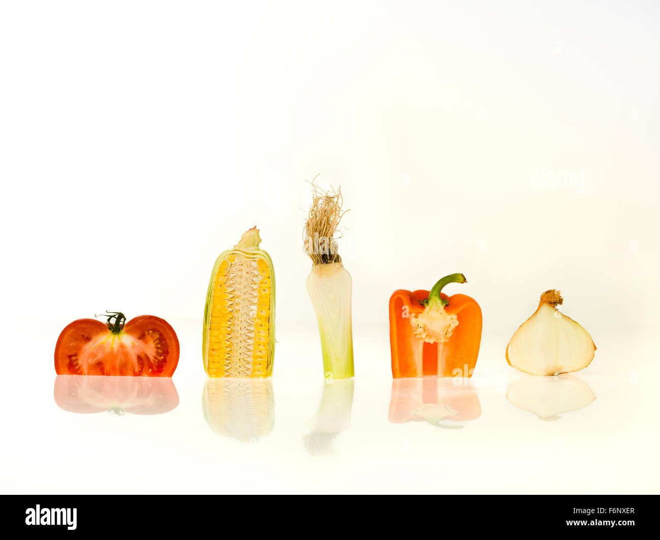sectioned vegetables on white background Stock Photo - Alamy