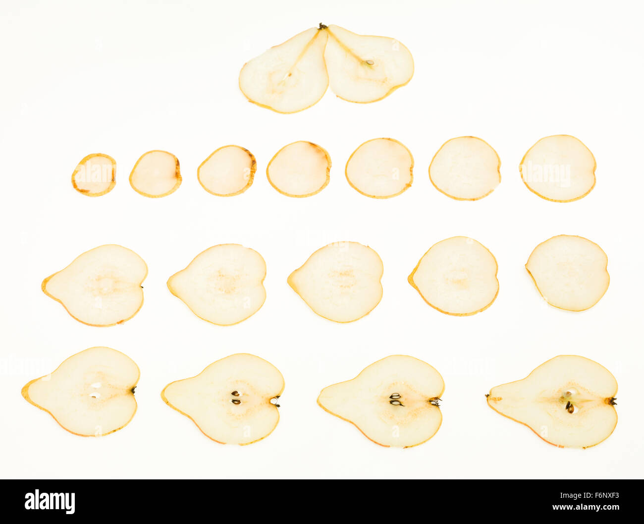 pear slices on white background sits low to high Stock Photo - Alamy