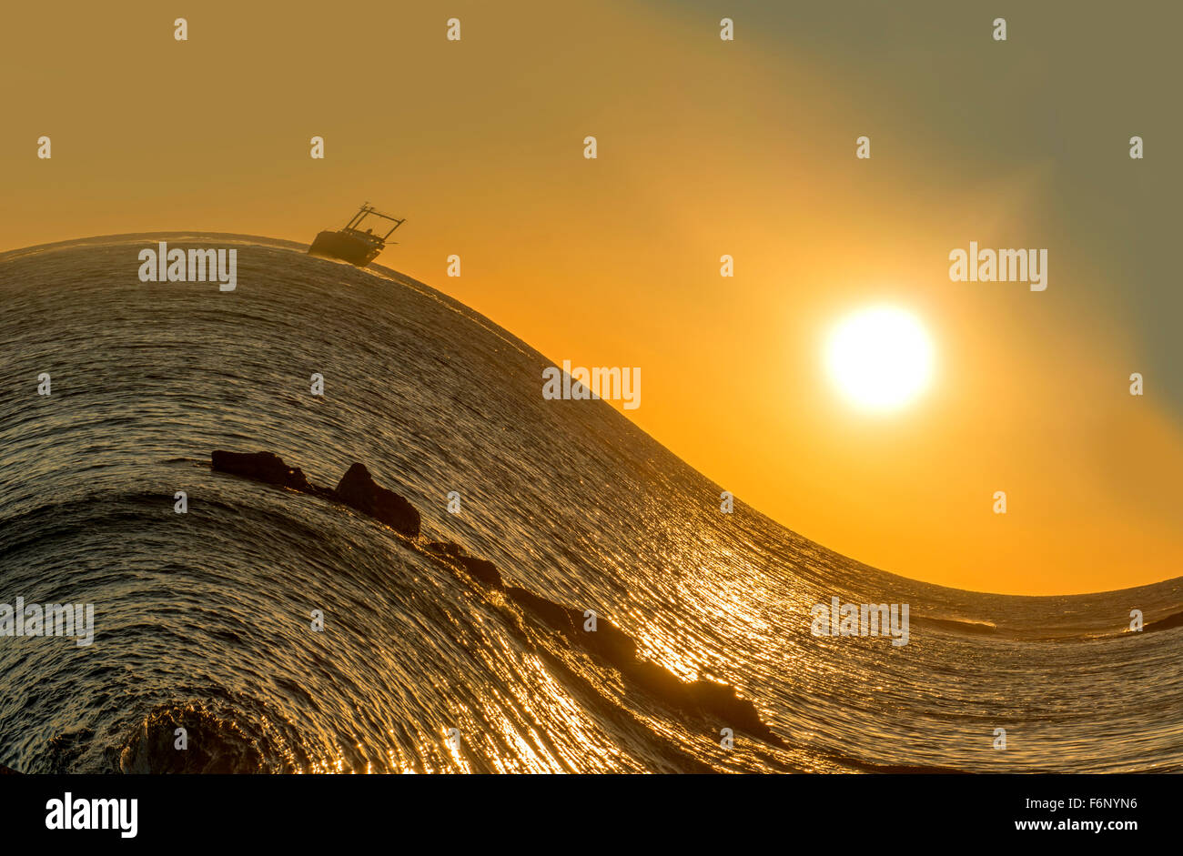 Ship Surfer surfing the wave at sunset. Location: Mediterranean Sea ...