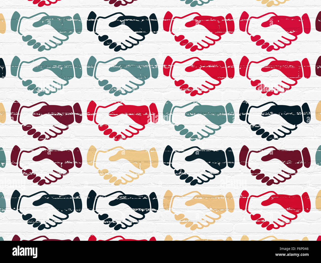 Political concept: Handshake icons on wall background Stock Photo - Alamy