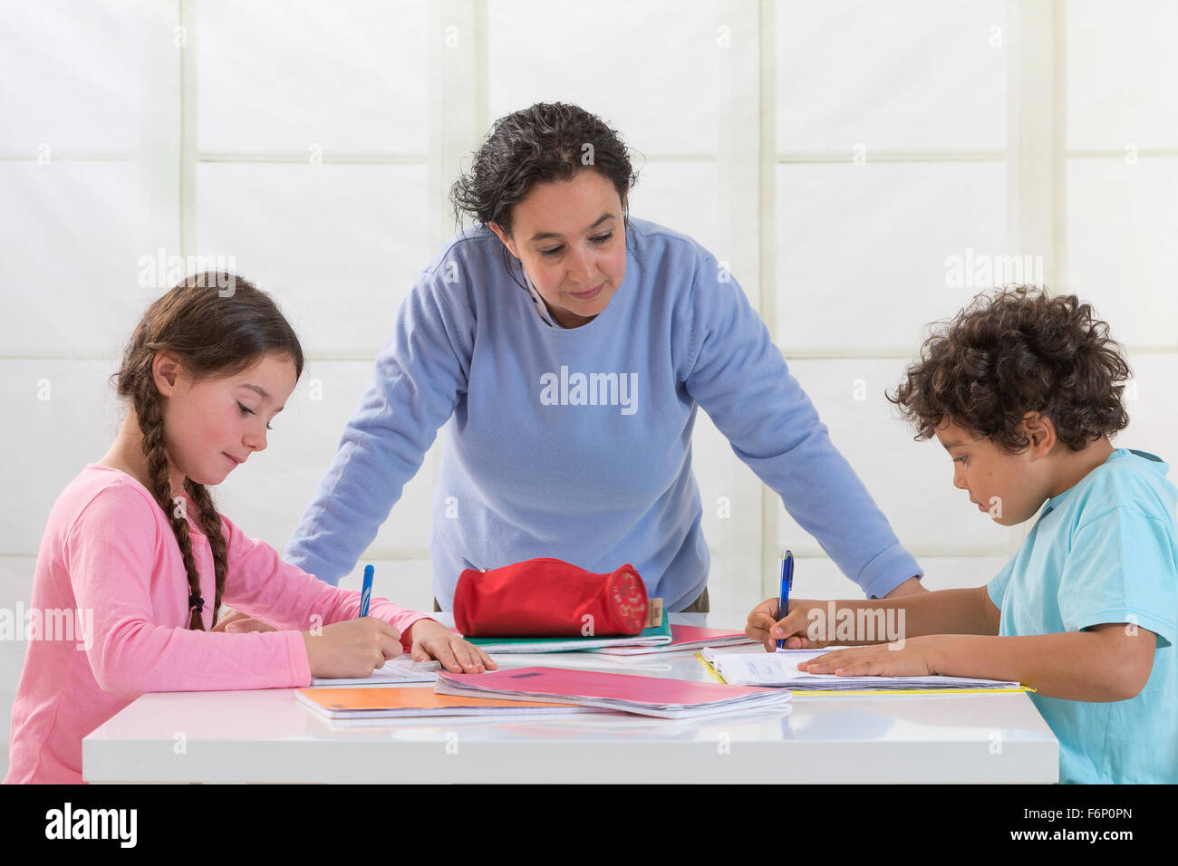 Brother help sister homework hi-res stock photography and images - Alamy