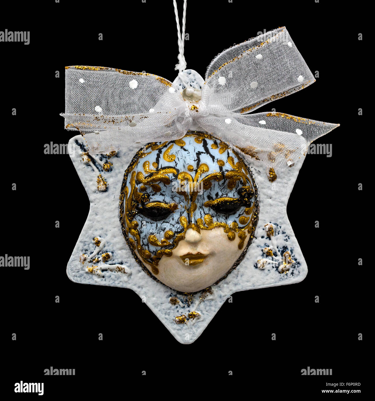 Beautiful mask of hand-worked for festive decoration, isolated on black ...