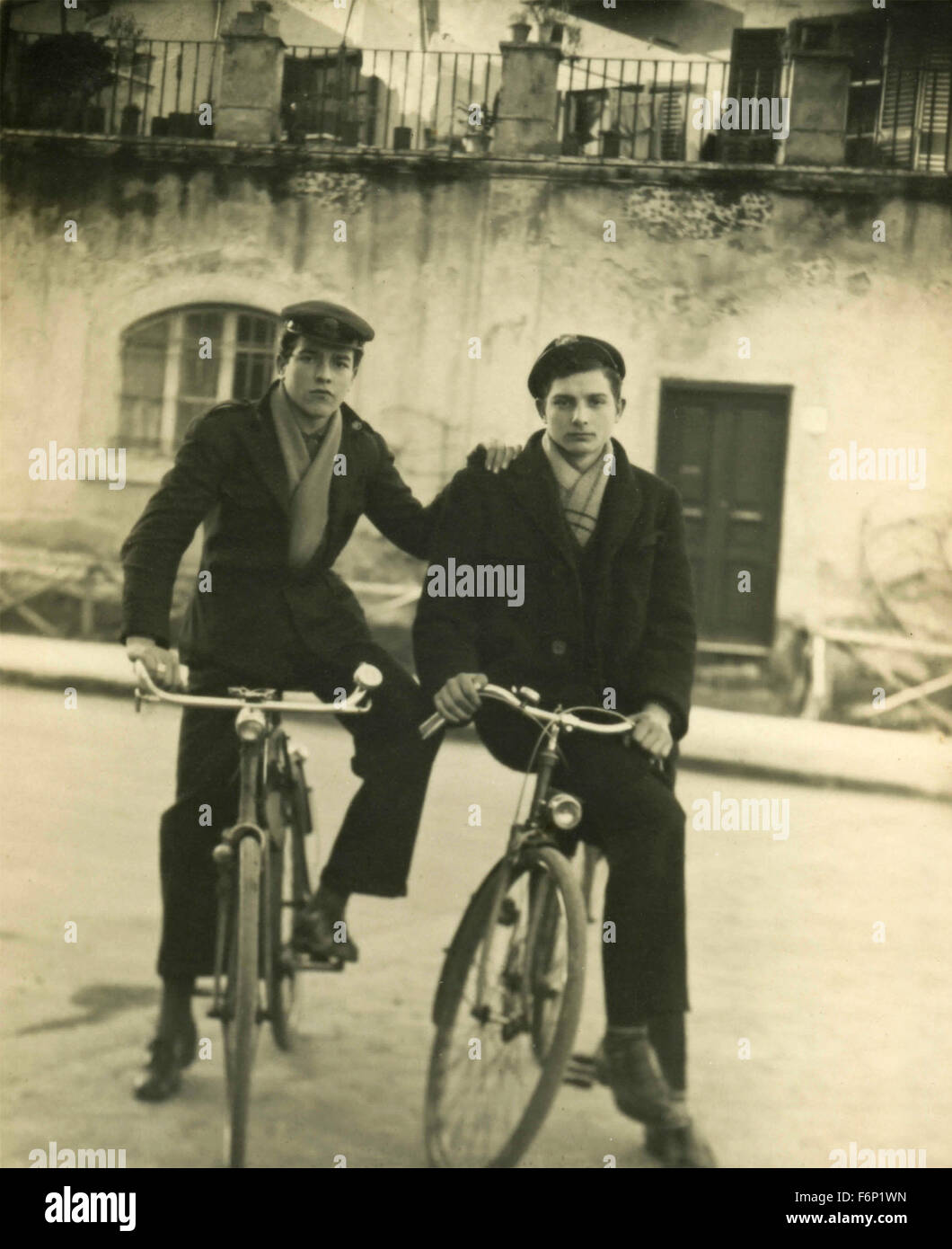 Two boys on bicycles, Italy Stock Photo - Alamy