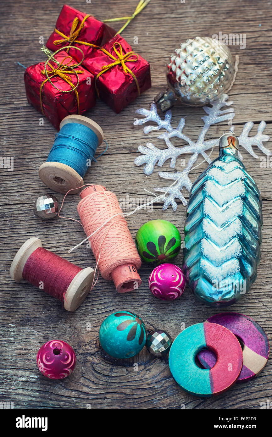 Spools of thread and beads in Christmas songs in vintage style Stock ...