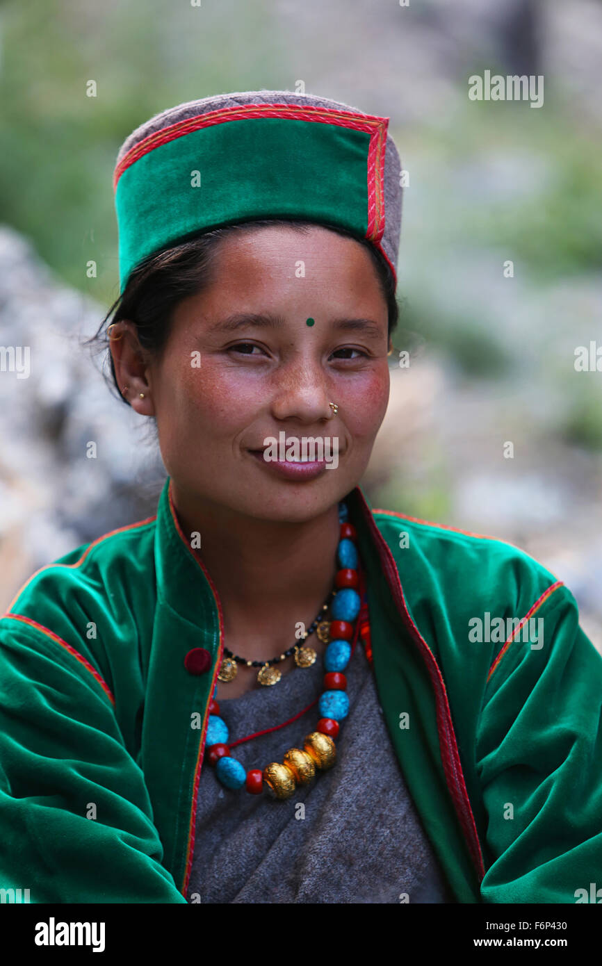 SPITI VALLEY - Kinnauri woman wearing traditional dress and green cap ...
