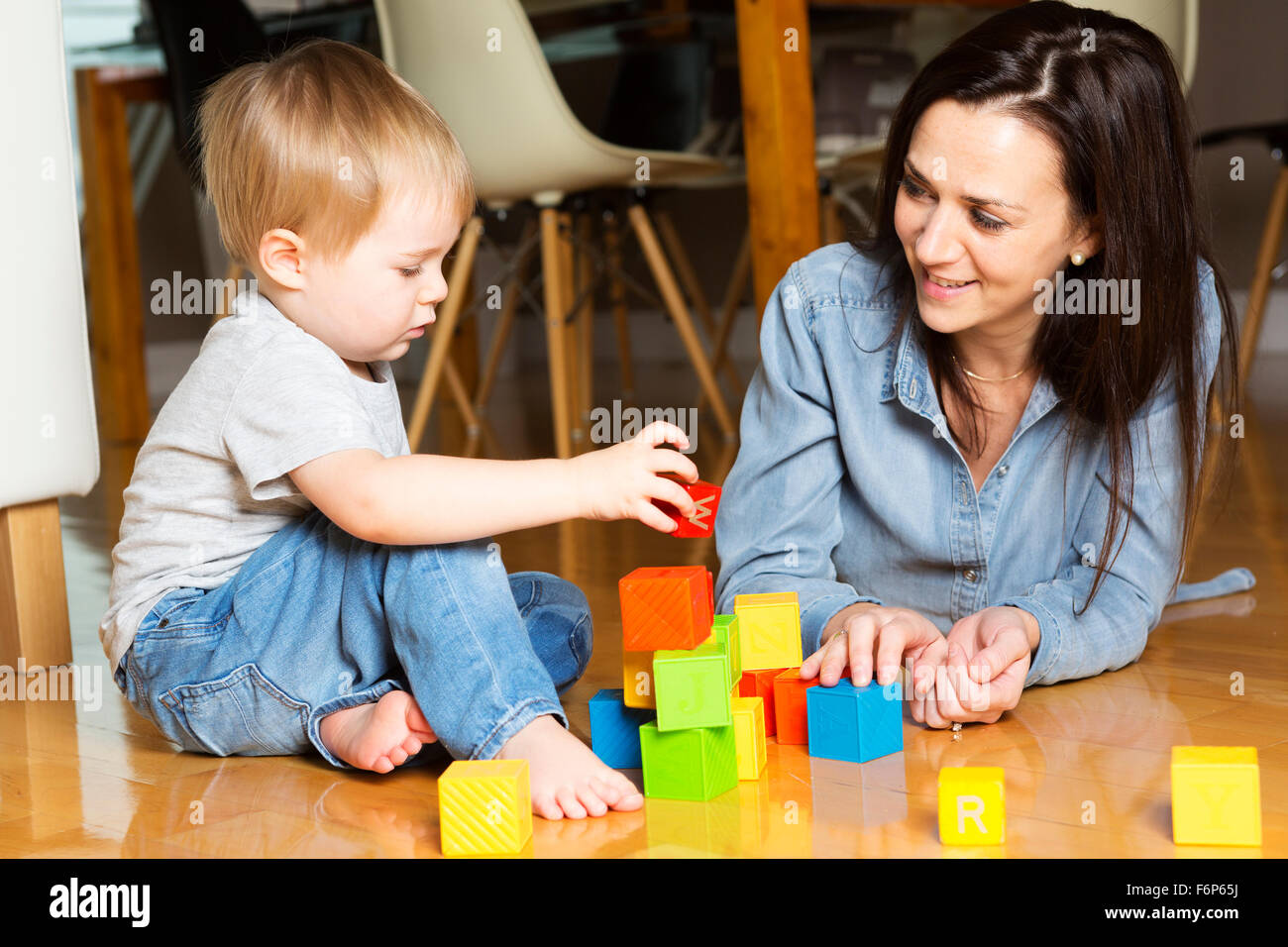 mother play block with his son at home Stock Photo - Alamy