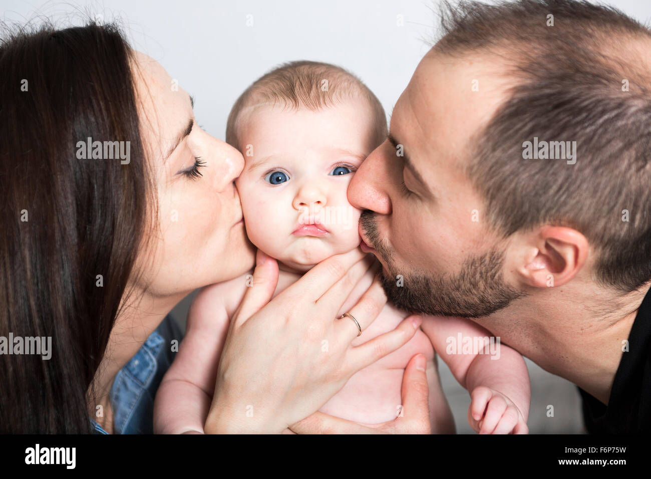 Portrait of a sleeping baby and parents Stock Photo - Alamy