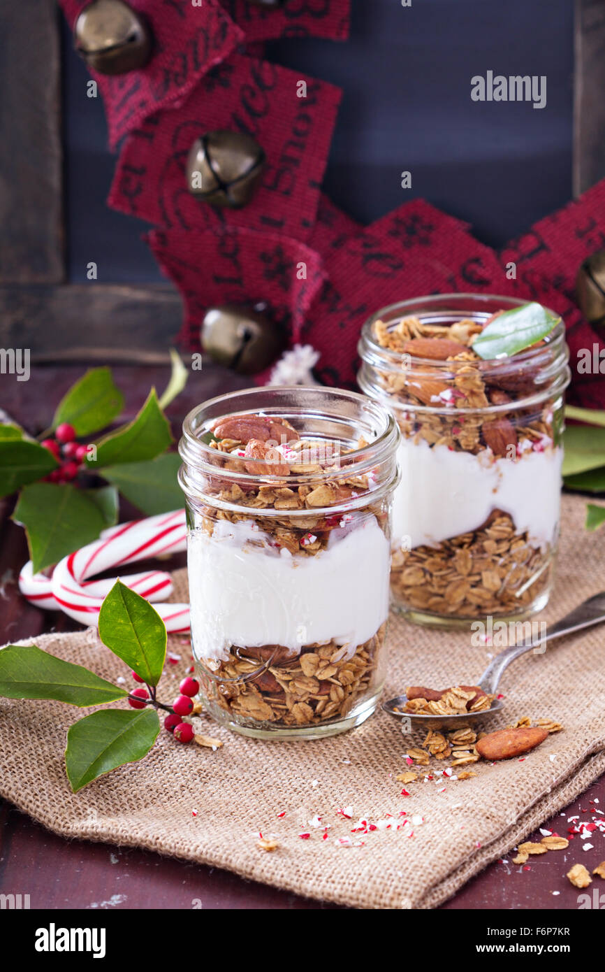 Gingerbread granola parfait with yogurt and crushed candy cane Stock ...