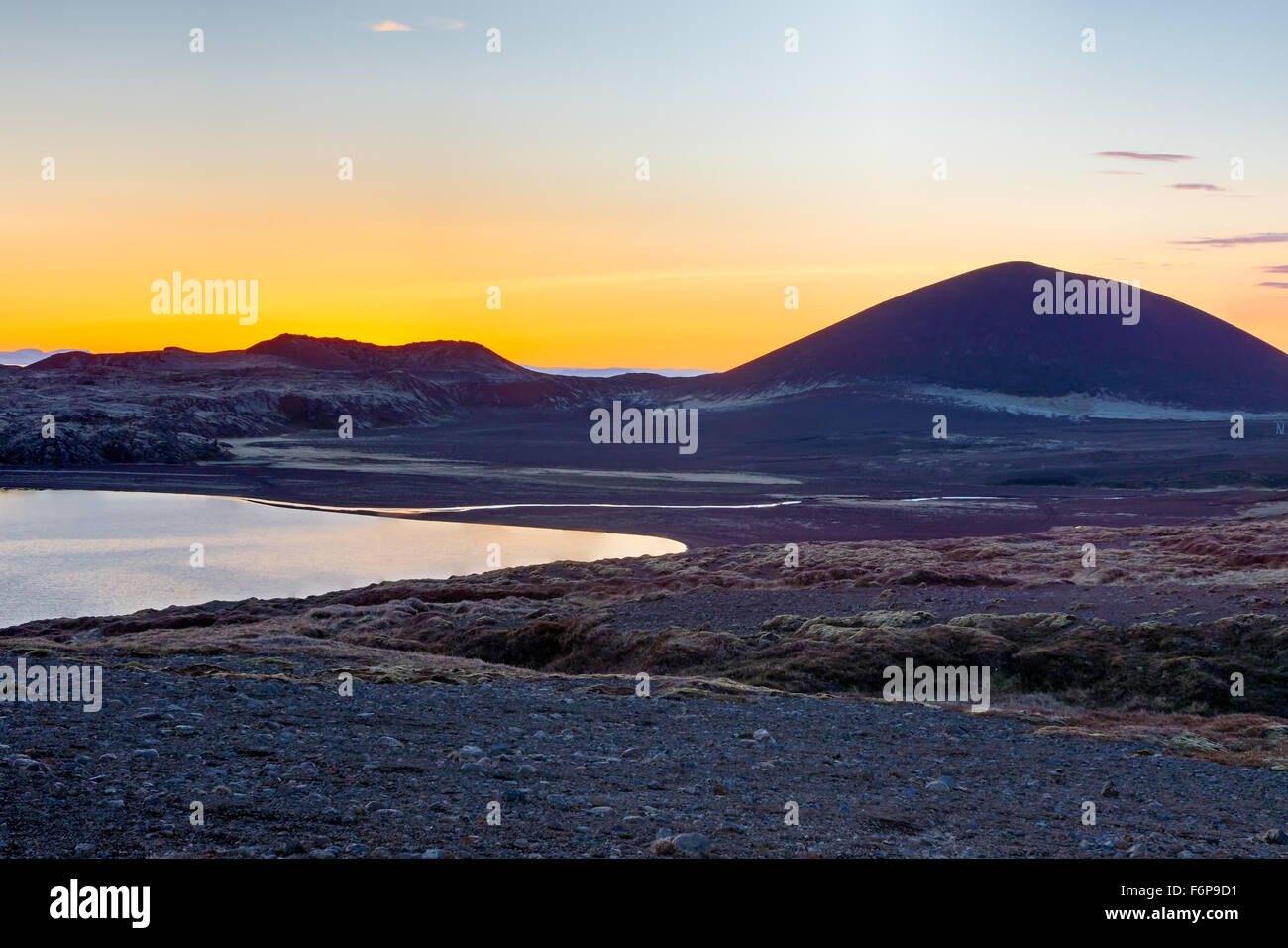 A volcanic landscape in Iceland at sunset Stock Photo - Alamy