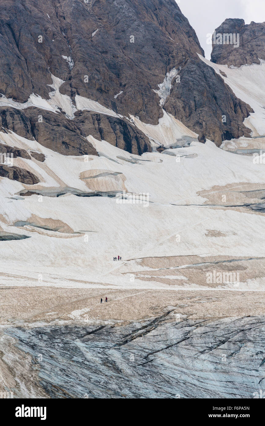 Hiking group at the Marmolata glacier, Dolomites, South Tyrol, Italy ...