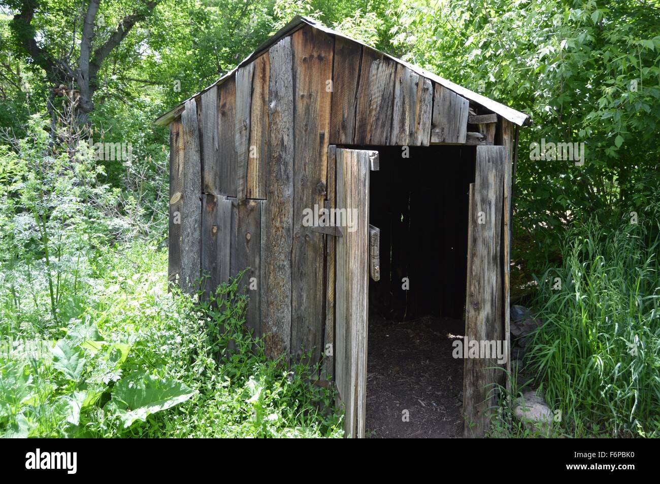 Old wooden building with door open Stock Photo - Alamy