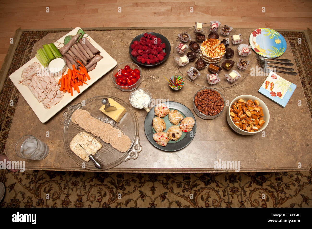 A layout of appetizers vegetables fruits candy and nuts. St Paul ...
