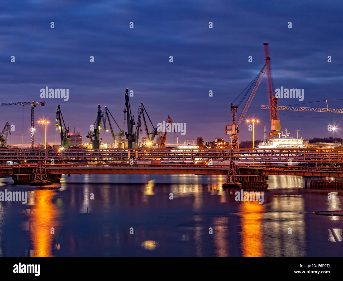 Industrial view of the Gdansk Shipyard at night, Poland Stock Photo - Alamy