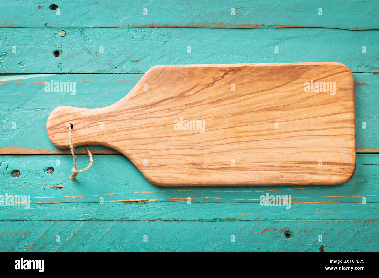 Wooden rustic background with a brown cutting board Stock Photo - Alamy