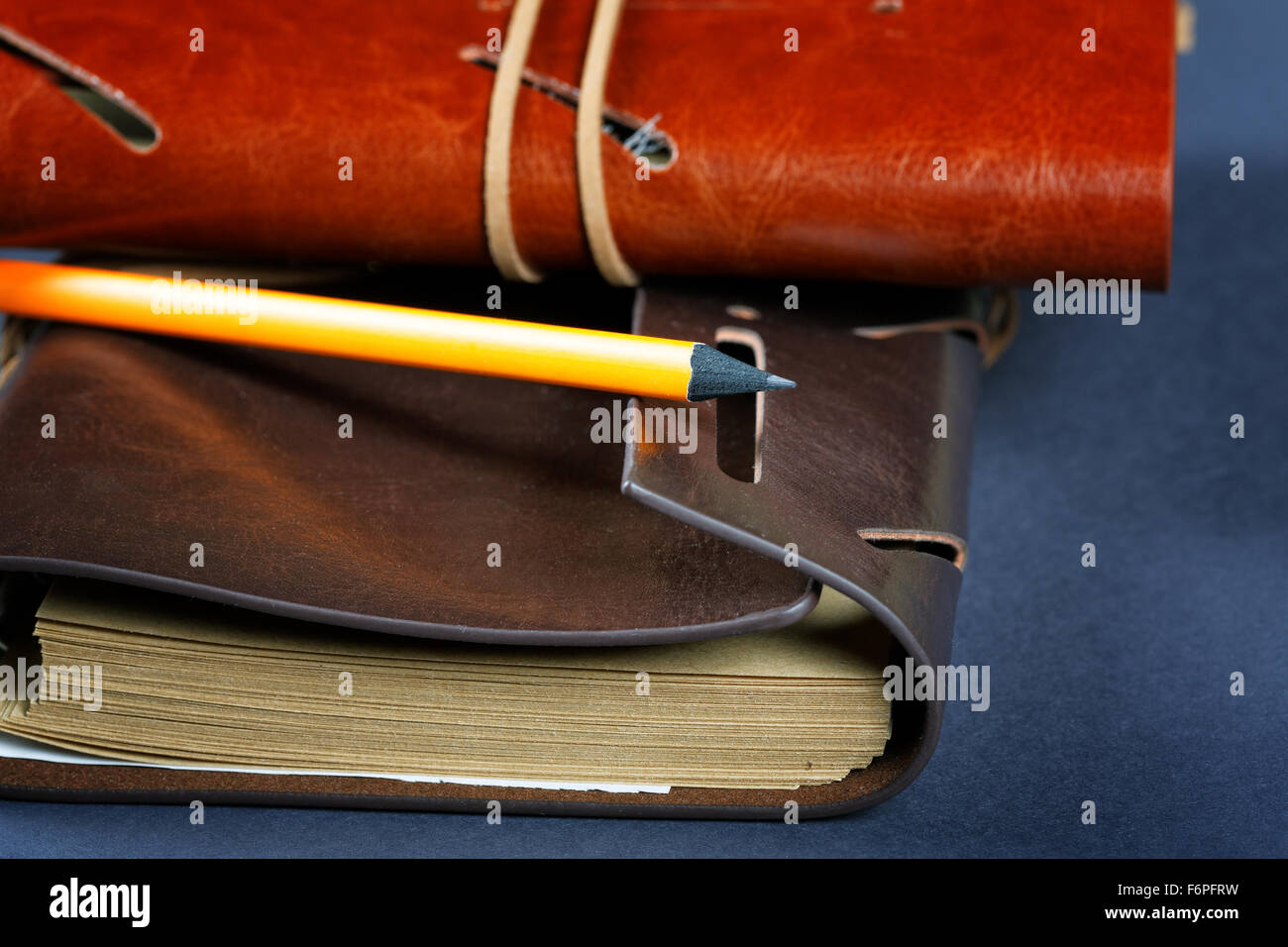 Pile of notebooks pencil hi-res stock photography and images - Alamy