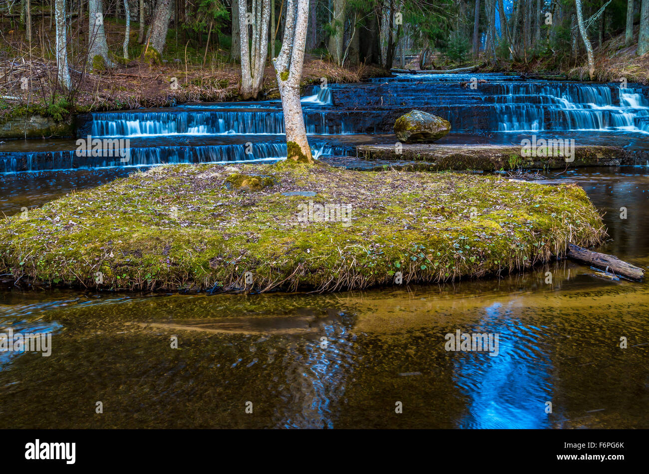 Waterfall with alone small island with standalone tree on it Stock ...