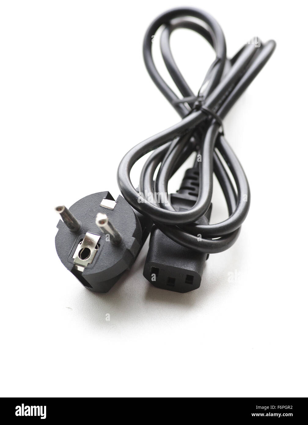 Black electric cable isolated on white Stock Photo - Alamy