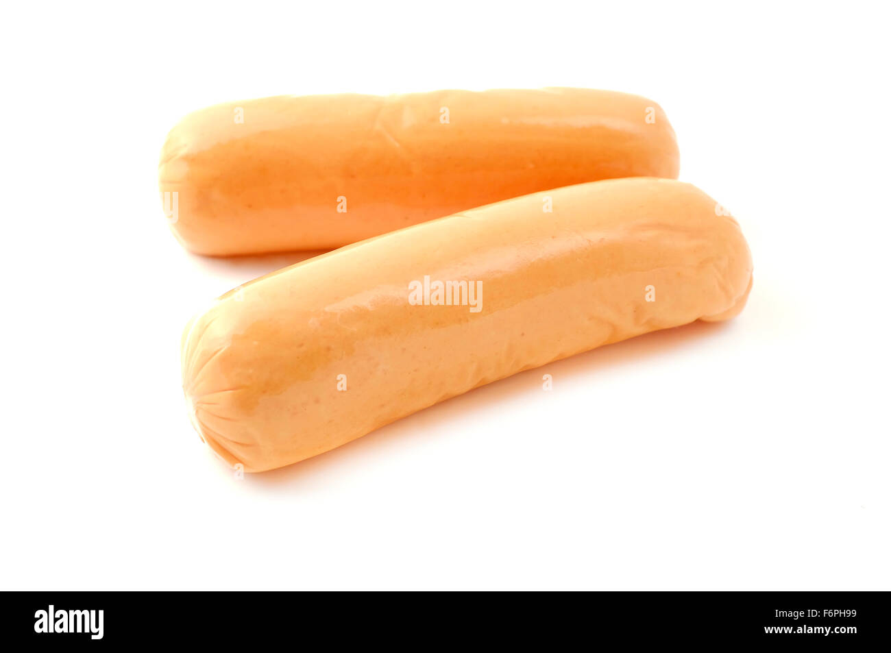 Raw cervelat on a white background Stock Photo - Alamy
