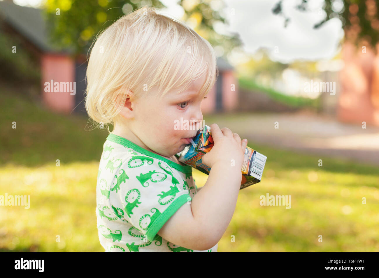 Boy drinking juice box hi-res stock photography and images - Alamy