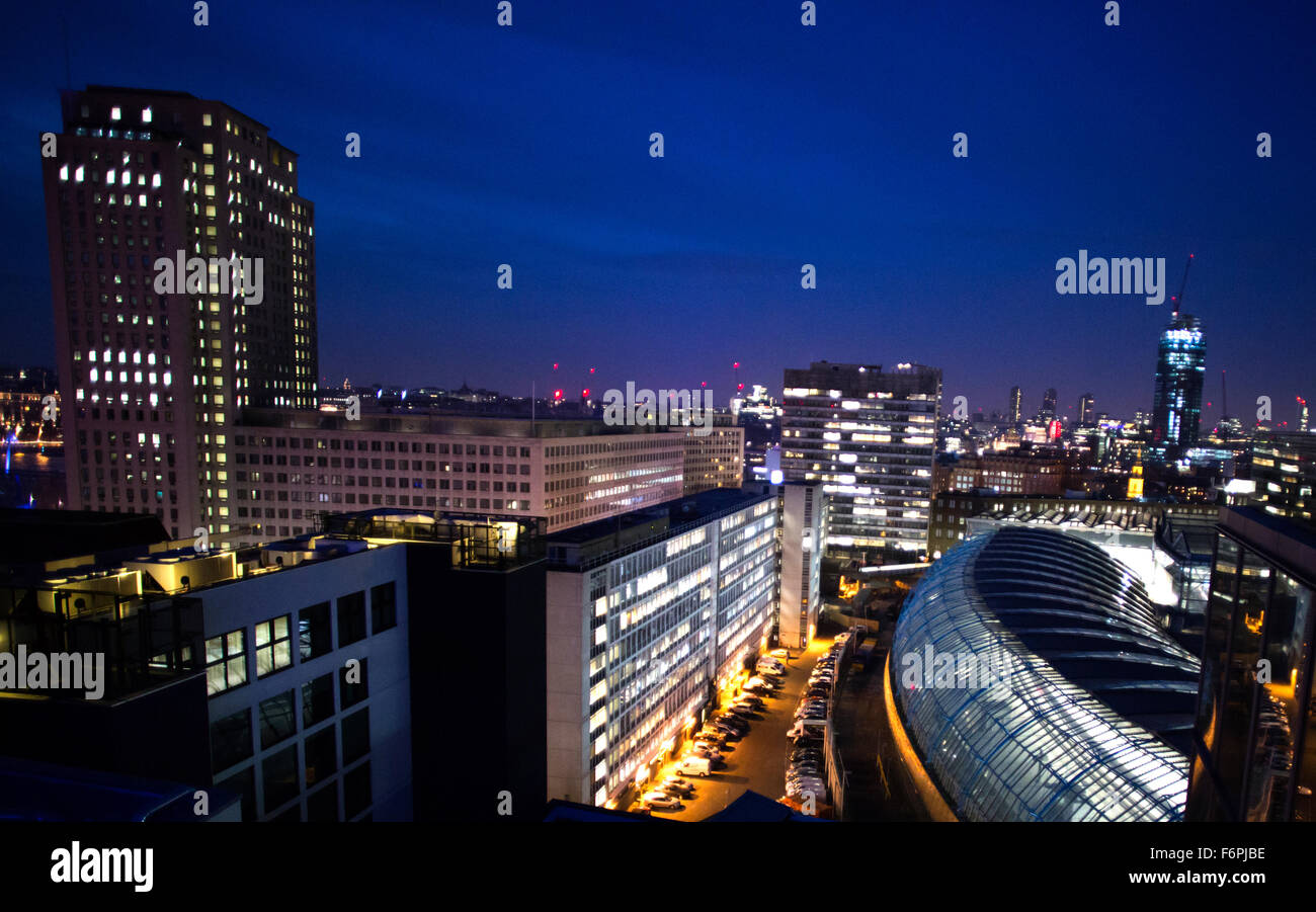 view of London, including Waterloo Station at night from an elevated ...
