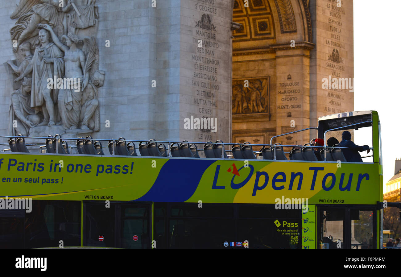 Paris, France. 18th Nov, 2015. A tour bus with few passengers drives on ...