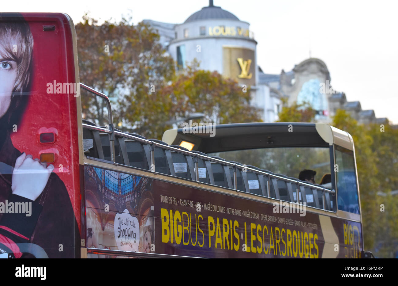 Paris, France. 18th Nov, 2015. A tour bus with few passengers drives ...