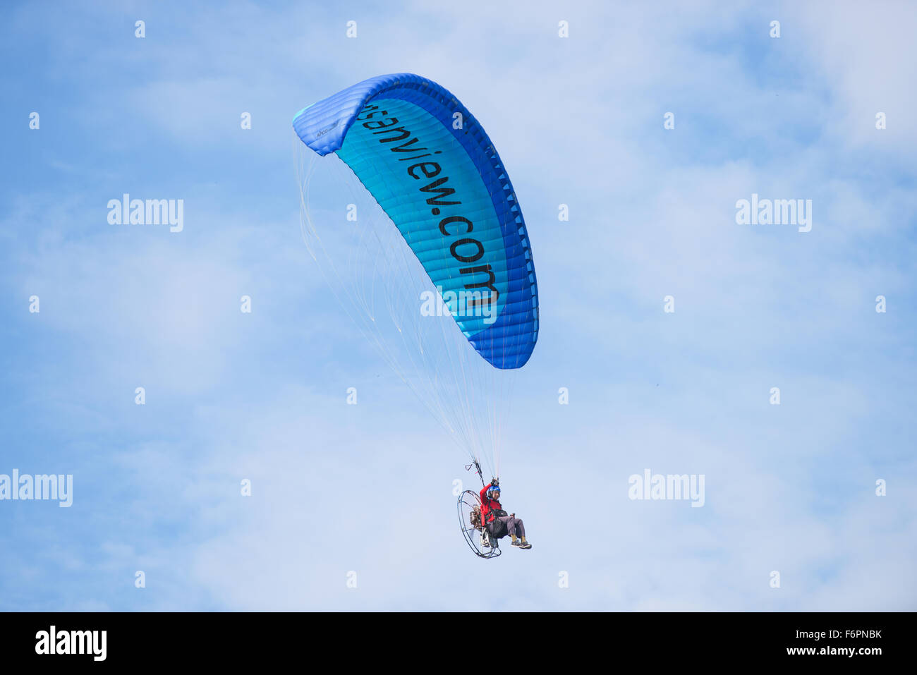 Paramotor flying over general city hi-res stock photography and images ...