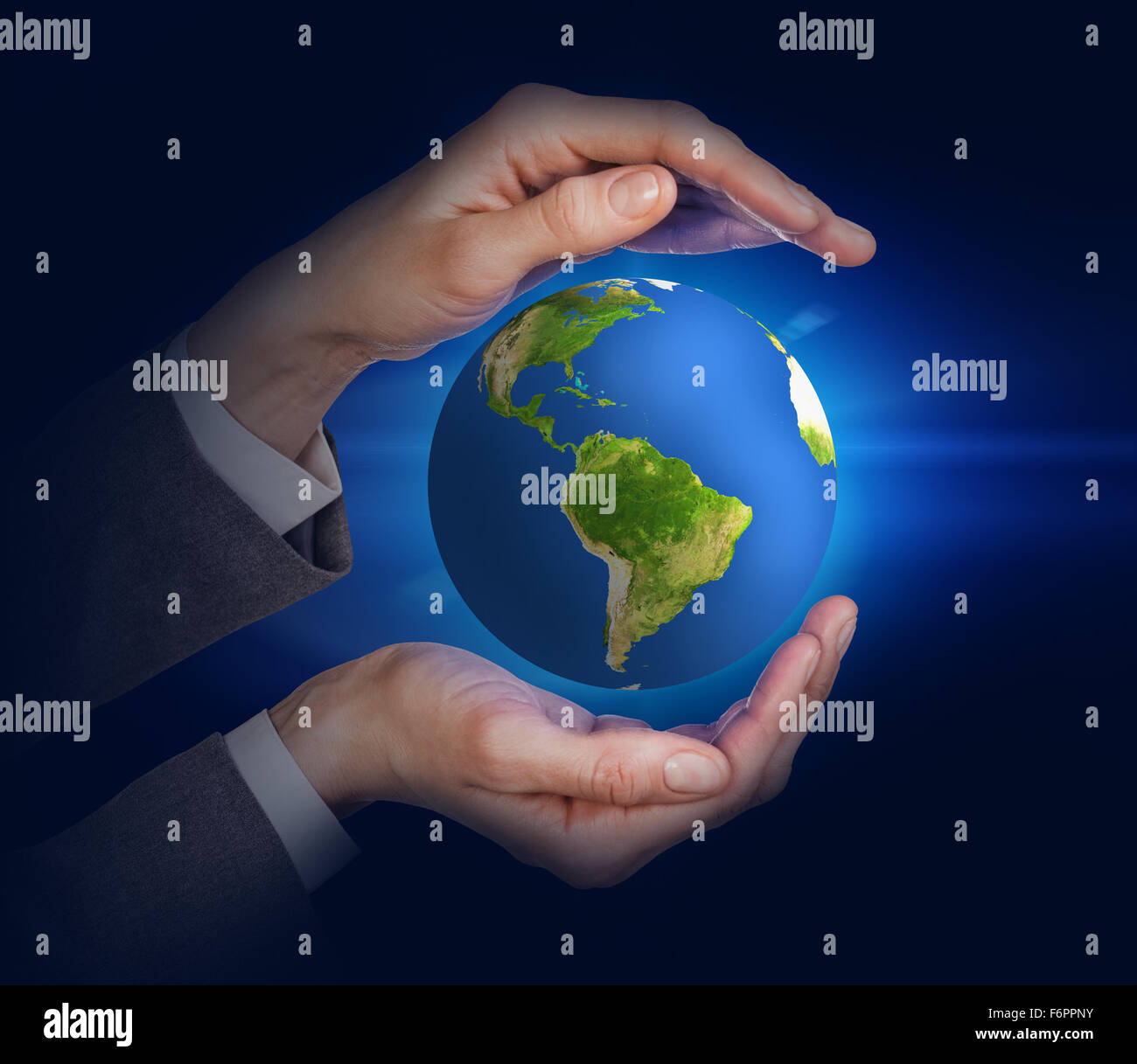 Earth in human hands on the black background. Elements of this image ...