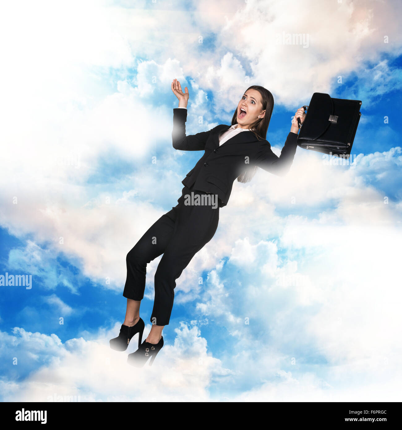 Business woman flying in the sky Stock Photo - Alamy