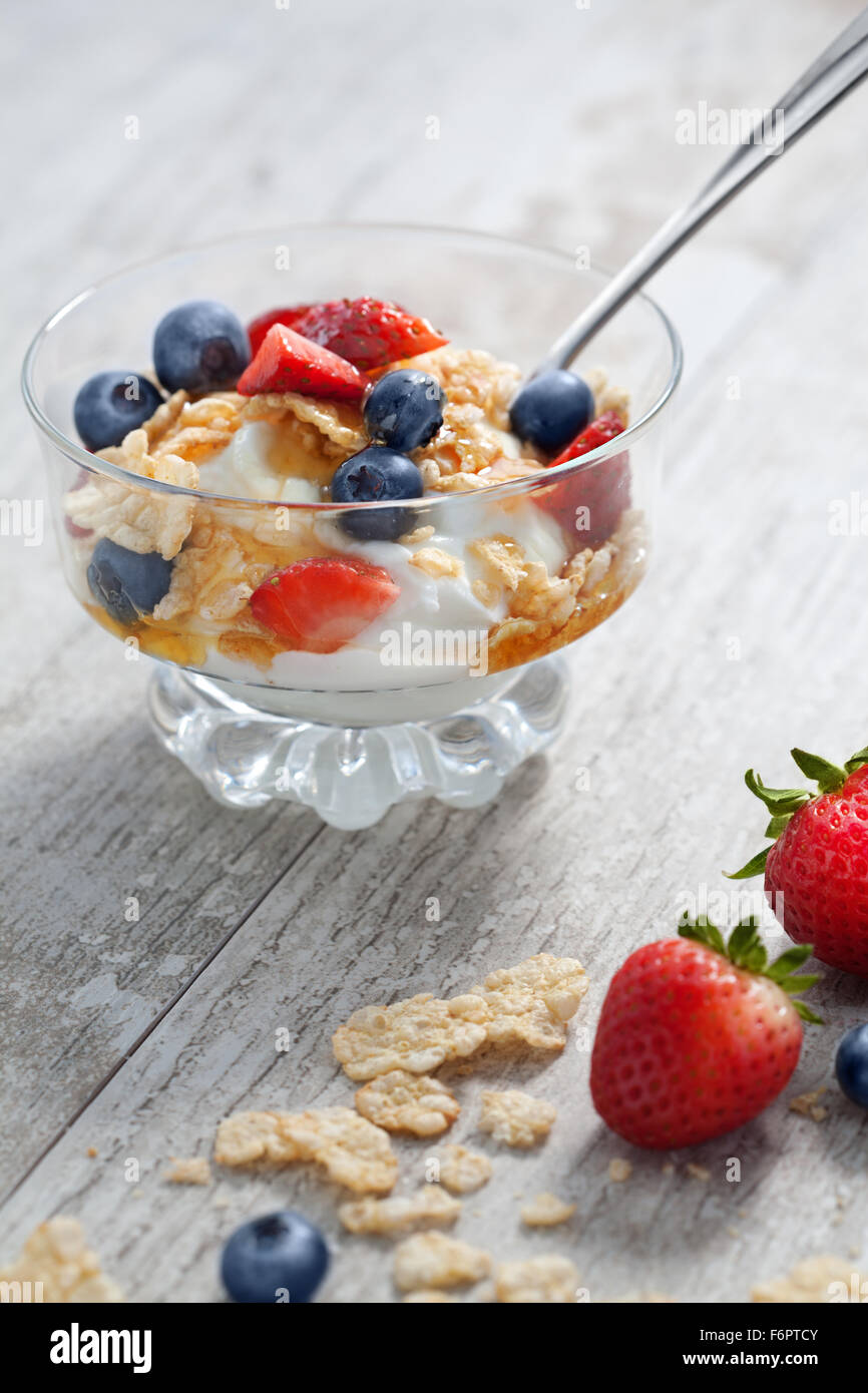 close up view of nice fresh yummy parfait on color back Stock Photo - Alamy