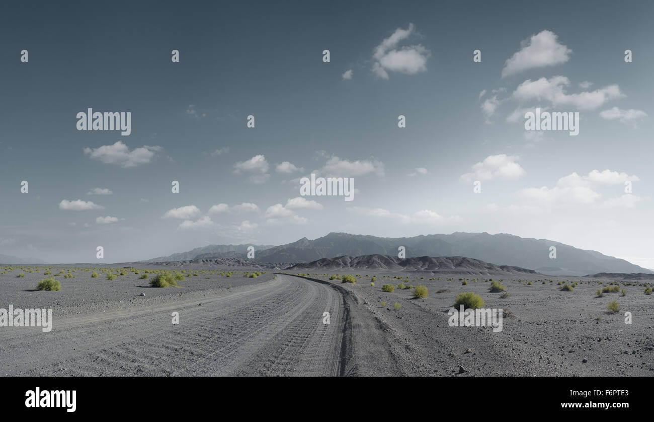 panoramic view of hot dusty road through the Nevada desert Stock Photo ...