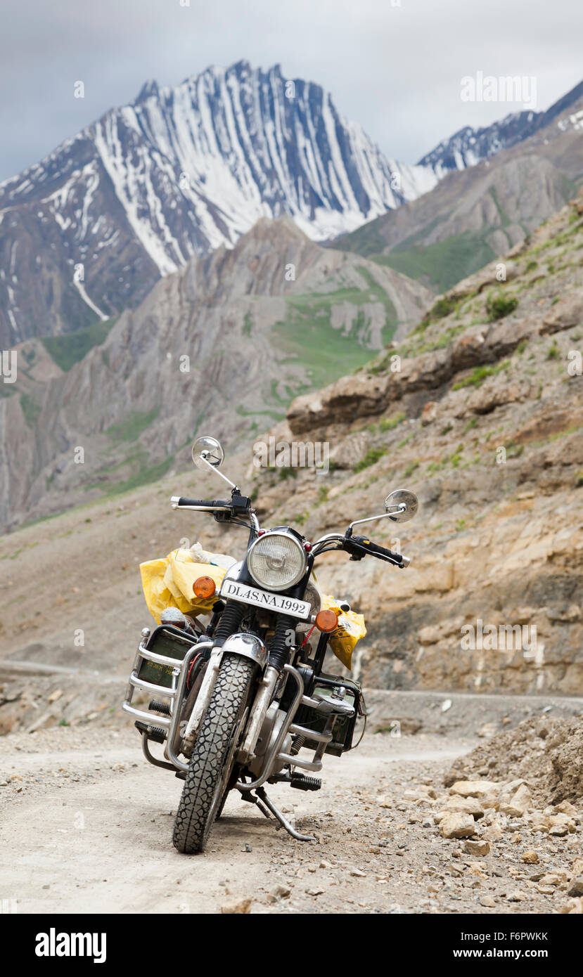 Indian Royal Enfield motor cycle in the mountainous Himalayan terrain ...