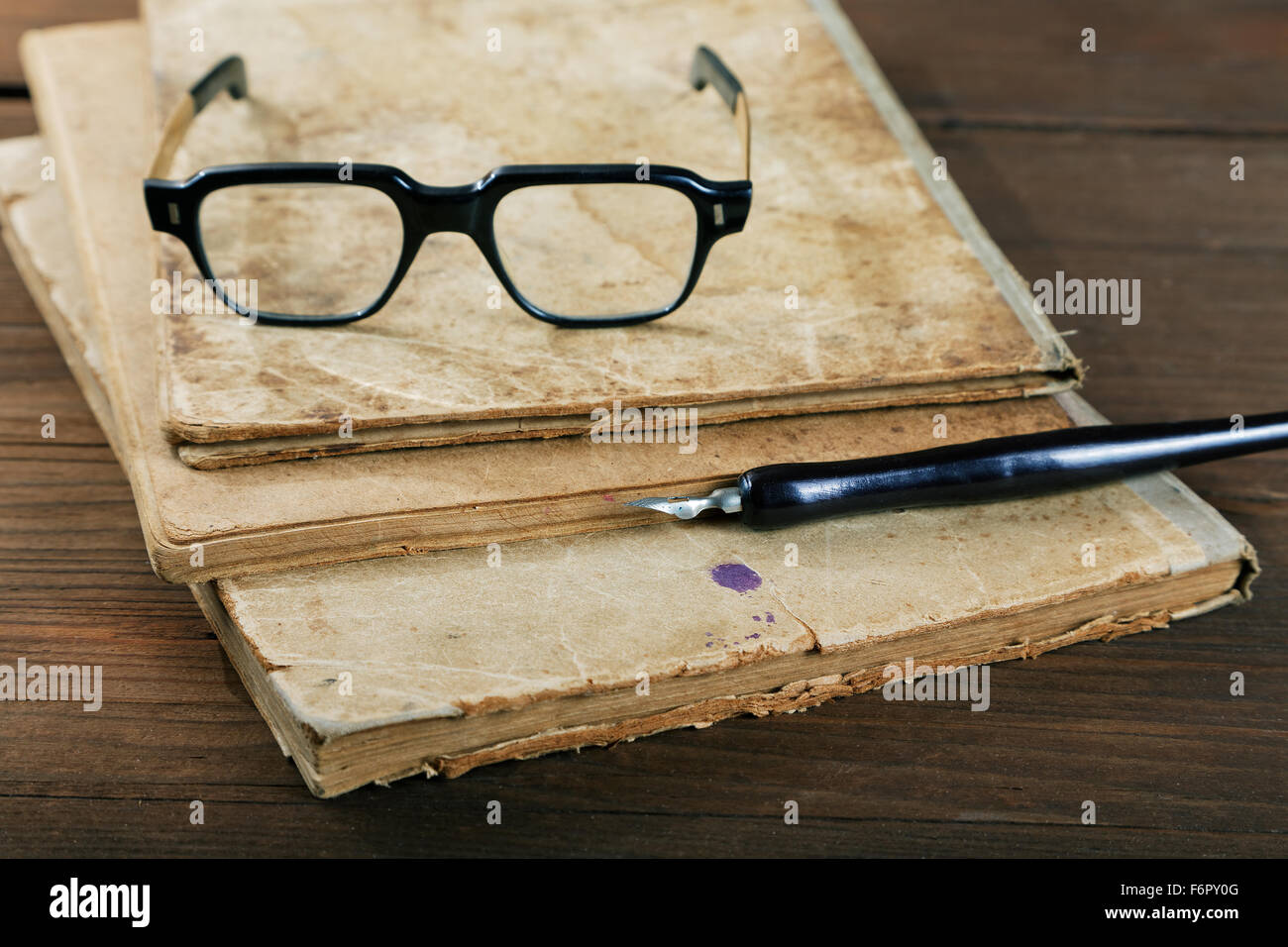 Still-life with old writing-books a nib Stock Photo - Alamy