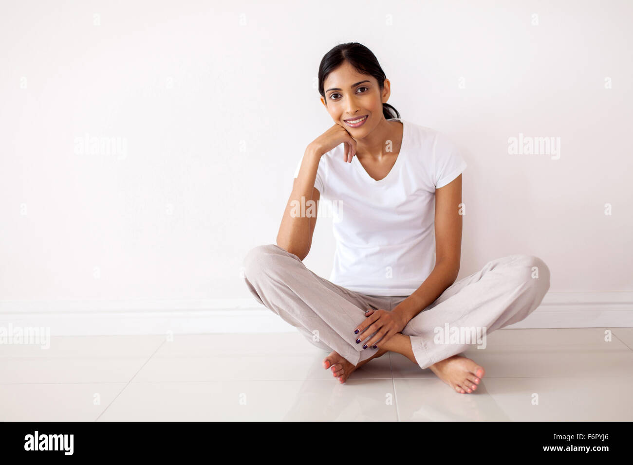 Indian girl sitting on house hi-res stock photography and images - Alamy