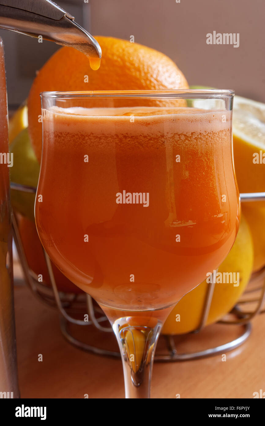 Making fresh juice Stock Photo - Alamy