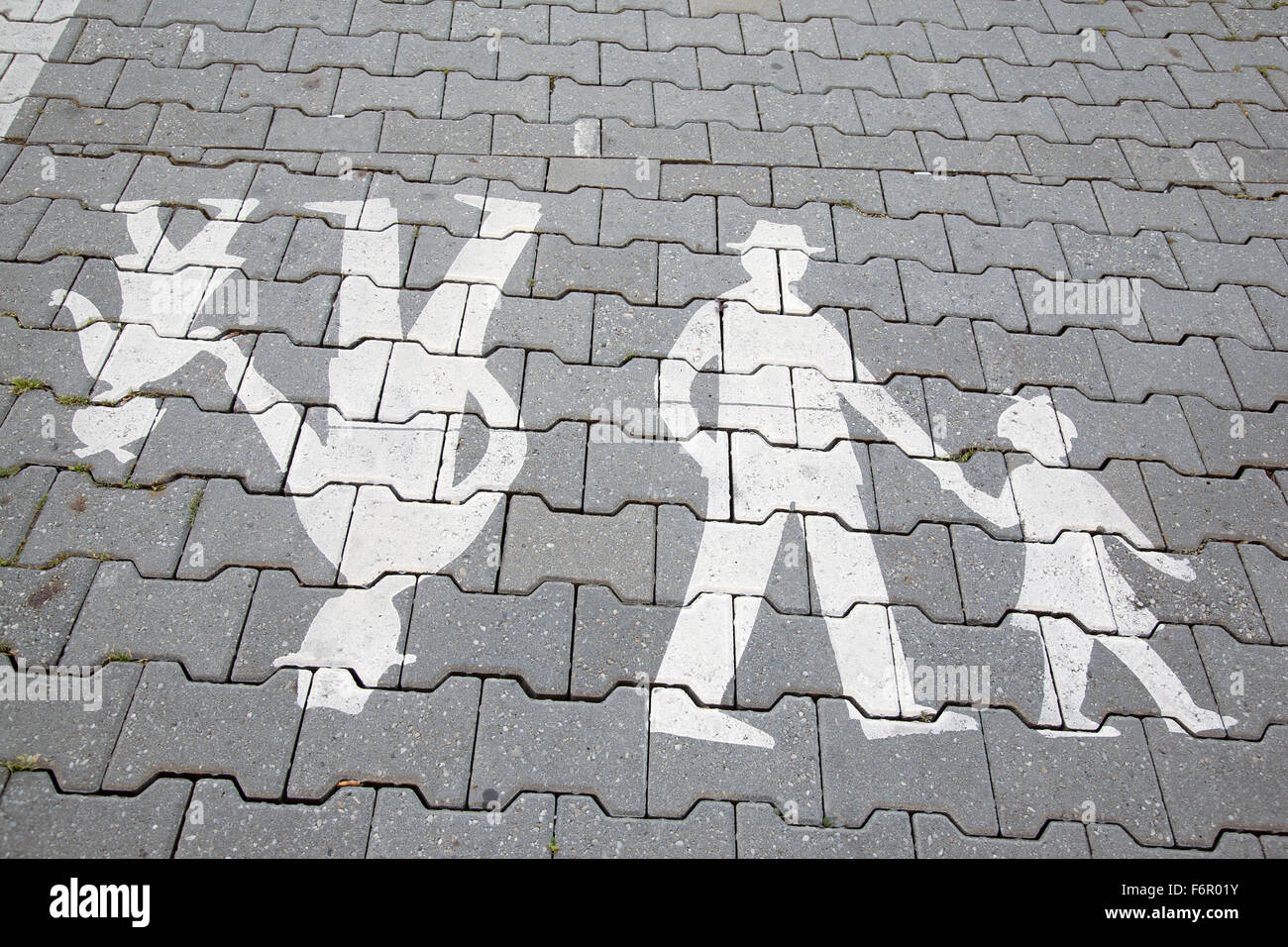 Family Pedestrian Sign on Pavement Stock Photo - Alamy