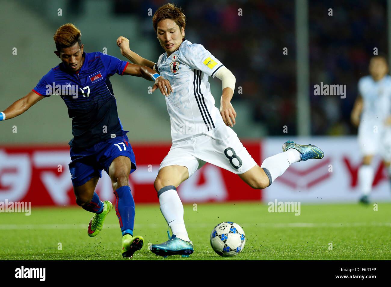 Phnom Penh, Cambodia. 17th Nov, 2015. Chhin Chhoeun (CAM), Genki Haraguchi (JPN) Football/Soccer ...