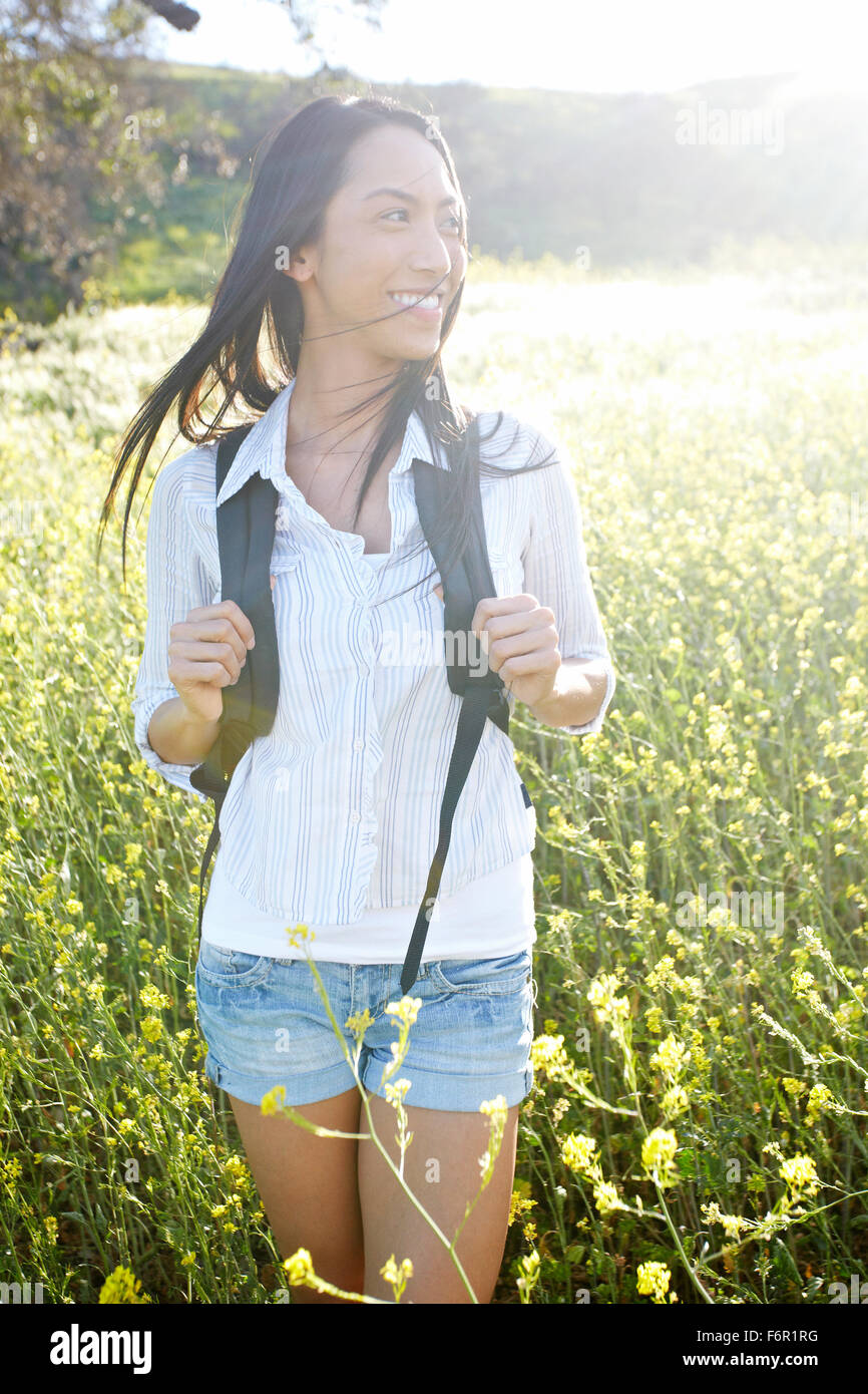 Lady carrying a backpack hi-res stock photography and images - Alamy