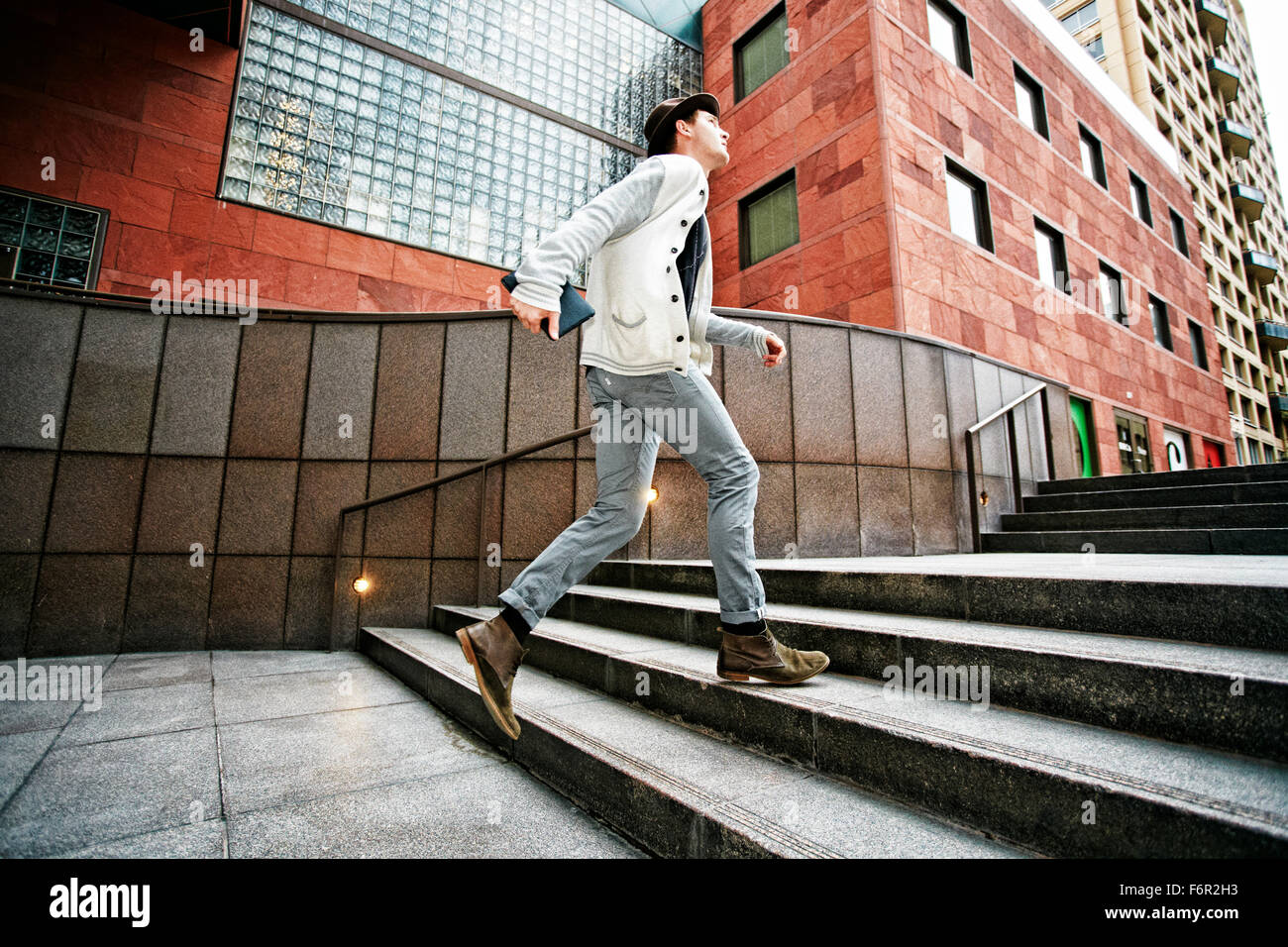 Man fedora walking hi-res stock photography and images - Alamy
