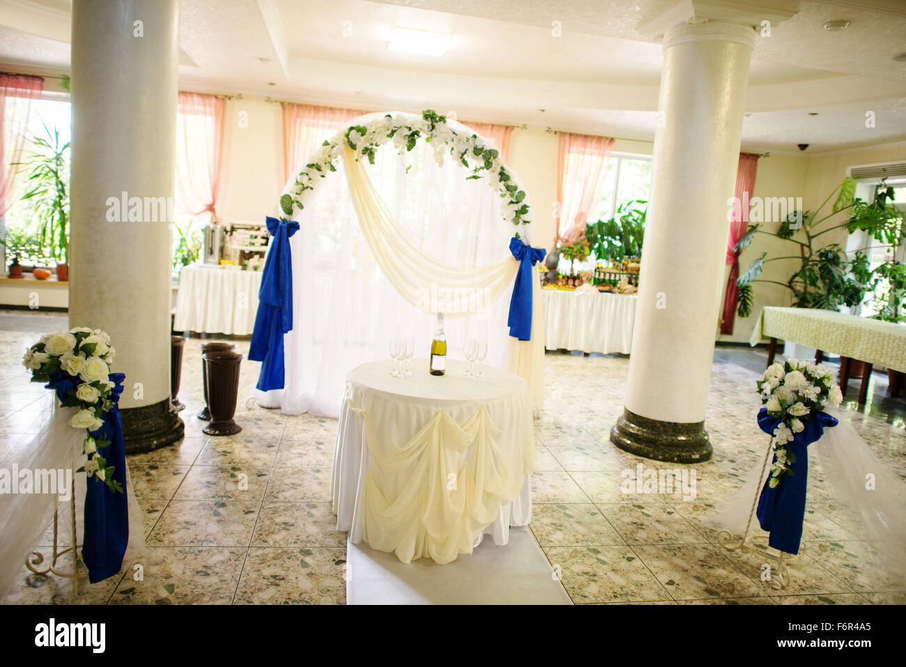 wedding arch at the restaurant Stock Photo - Alamy