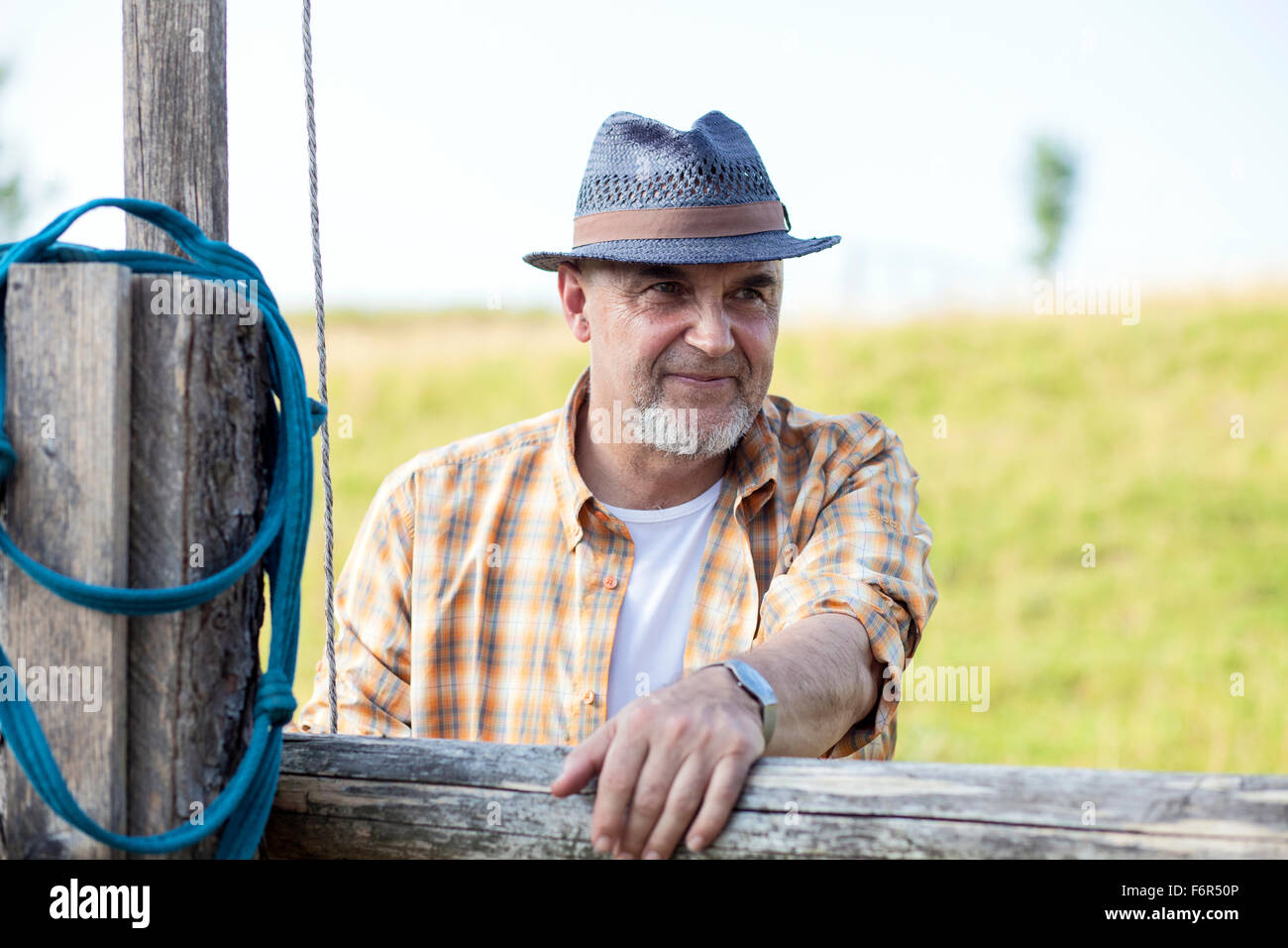 Man working on fence hi-res stock photography and images - Alamy