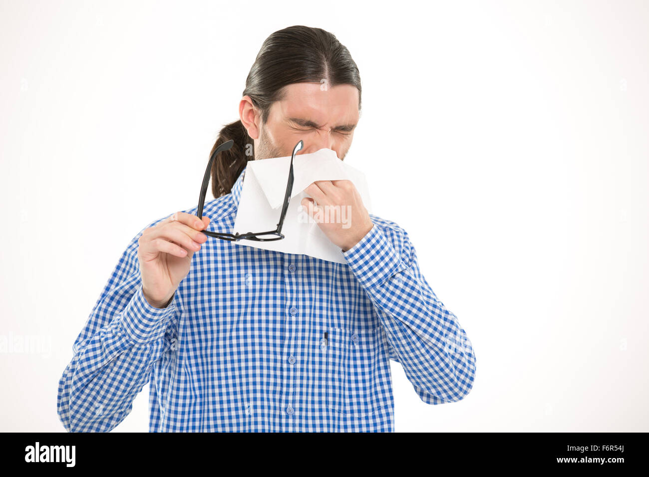 Sneezing young man hi-res stock photography and images - Alamy
