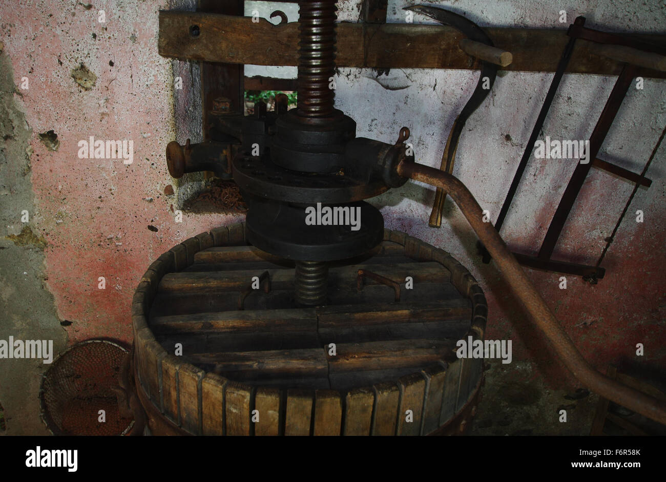 Old grapes press, machine for pressing and making wine Stock Photo - Alamy